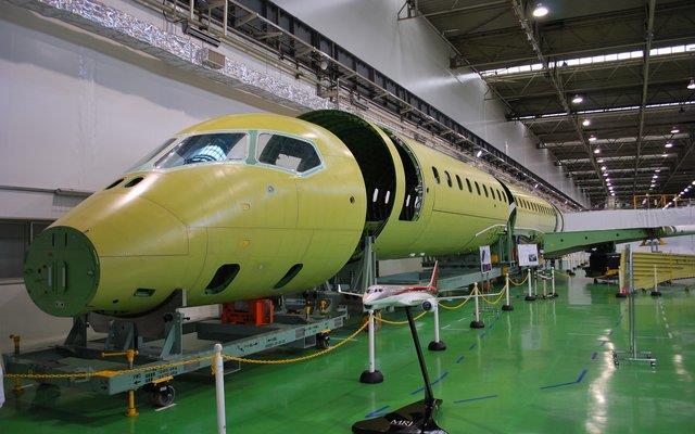 PICTURES: Mitsubishi unveils MRJ fuselage | News | Flight Global