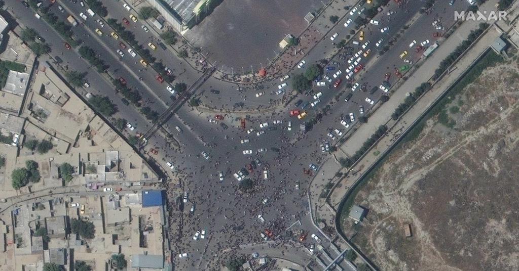 Satellite imagery shows crowds, aircraft at Kabul airport | News ...