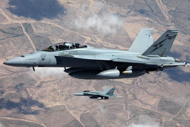 PICTURES: RAAF F-18s slam IS militants | News | Flight Global