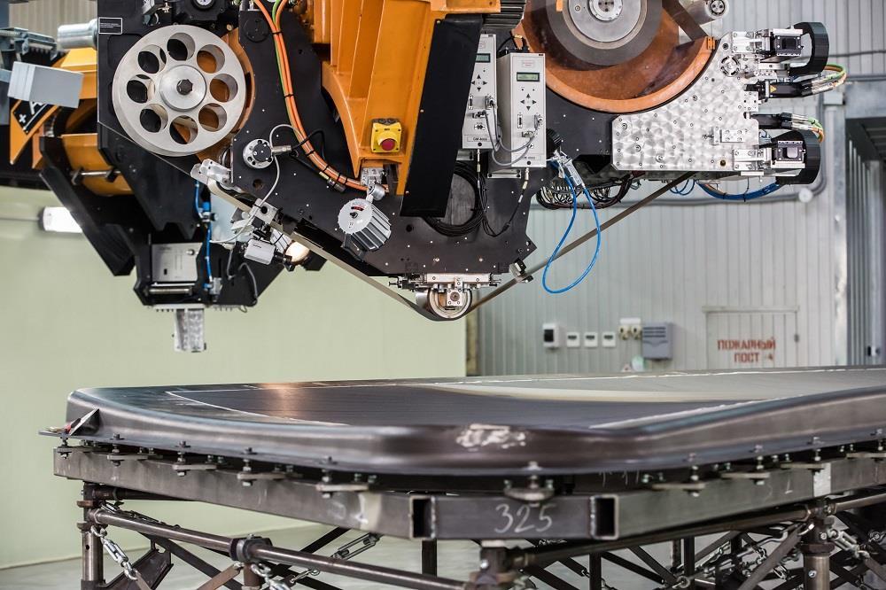 Russian-built composite-laying robot developed to produce MC-21 wings ...