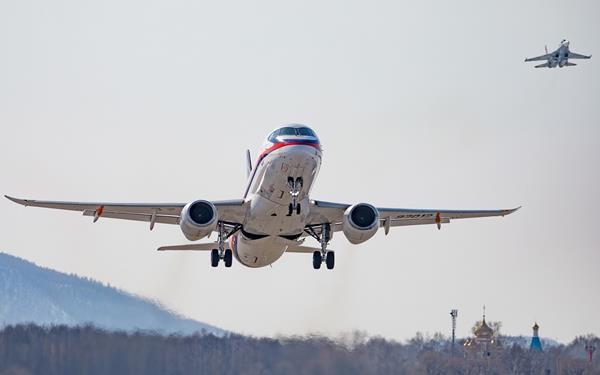 Modified Superjet 100 conducts maiden flight with Russian-built PD-8 ...