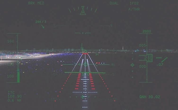 Dash 8's lights would have blended with runway centreline before A350 ...